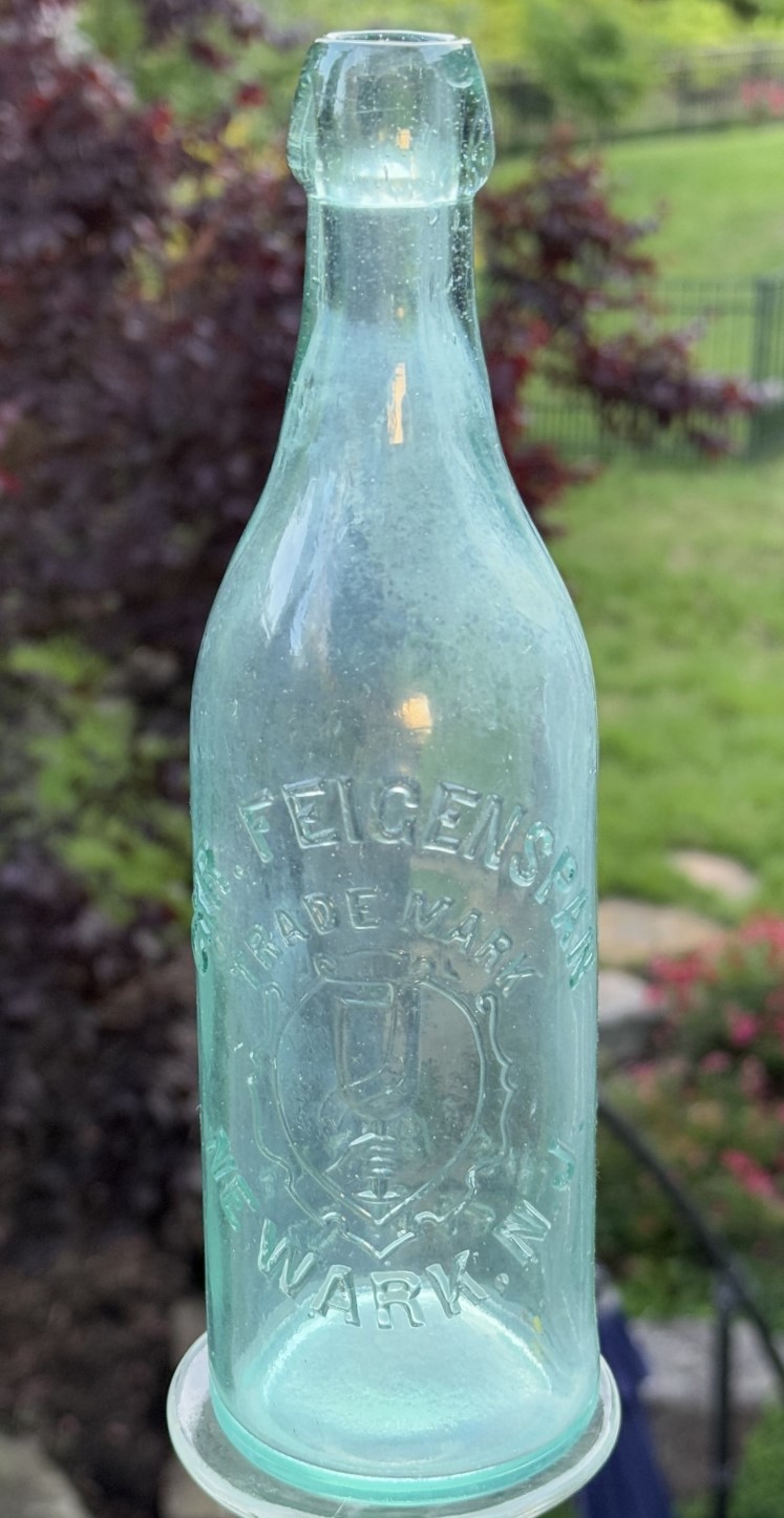 Item #110912 1875 Feigenspan & Co. Brewery Beer (aqua) Bottle